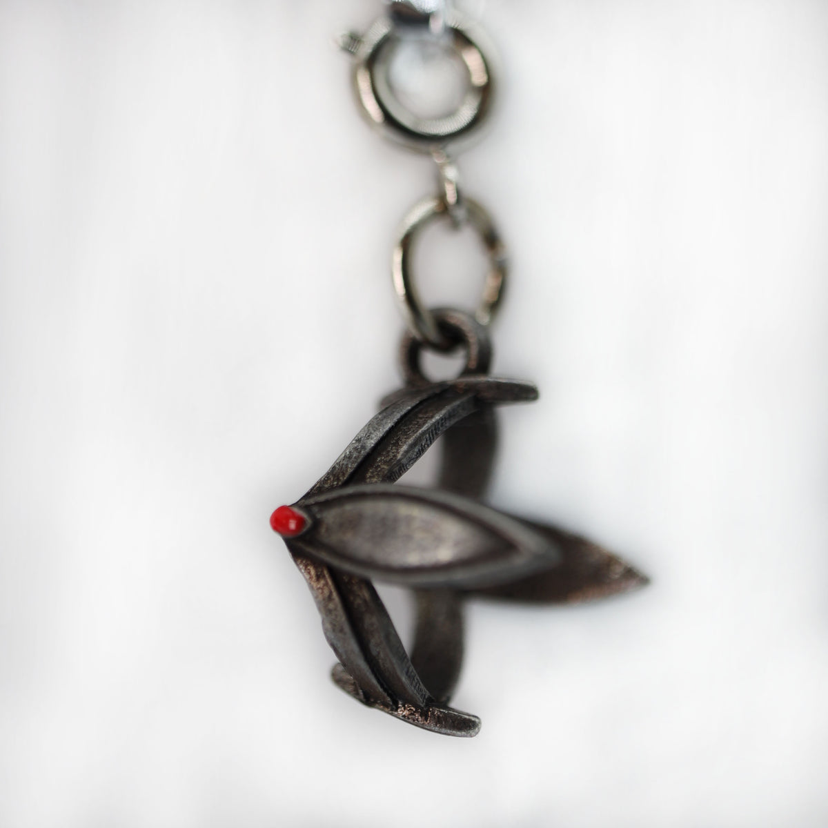 Traveler's Trinkets: Iron Crown Charm – Foam Brain Games